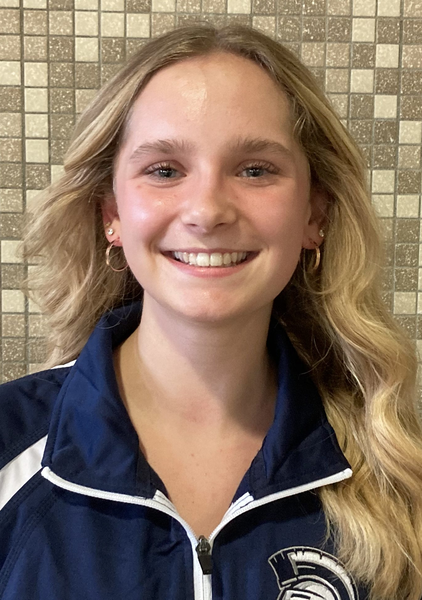 Kayla Wolfe – THE SPORTS PAGE
