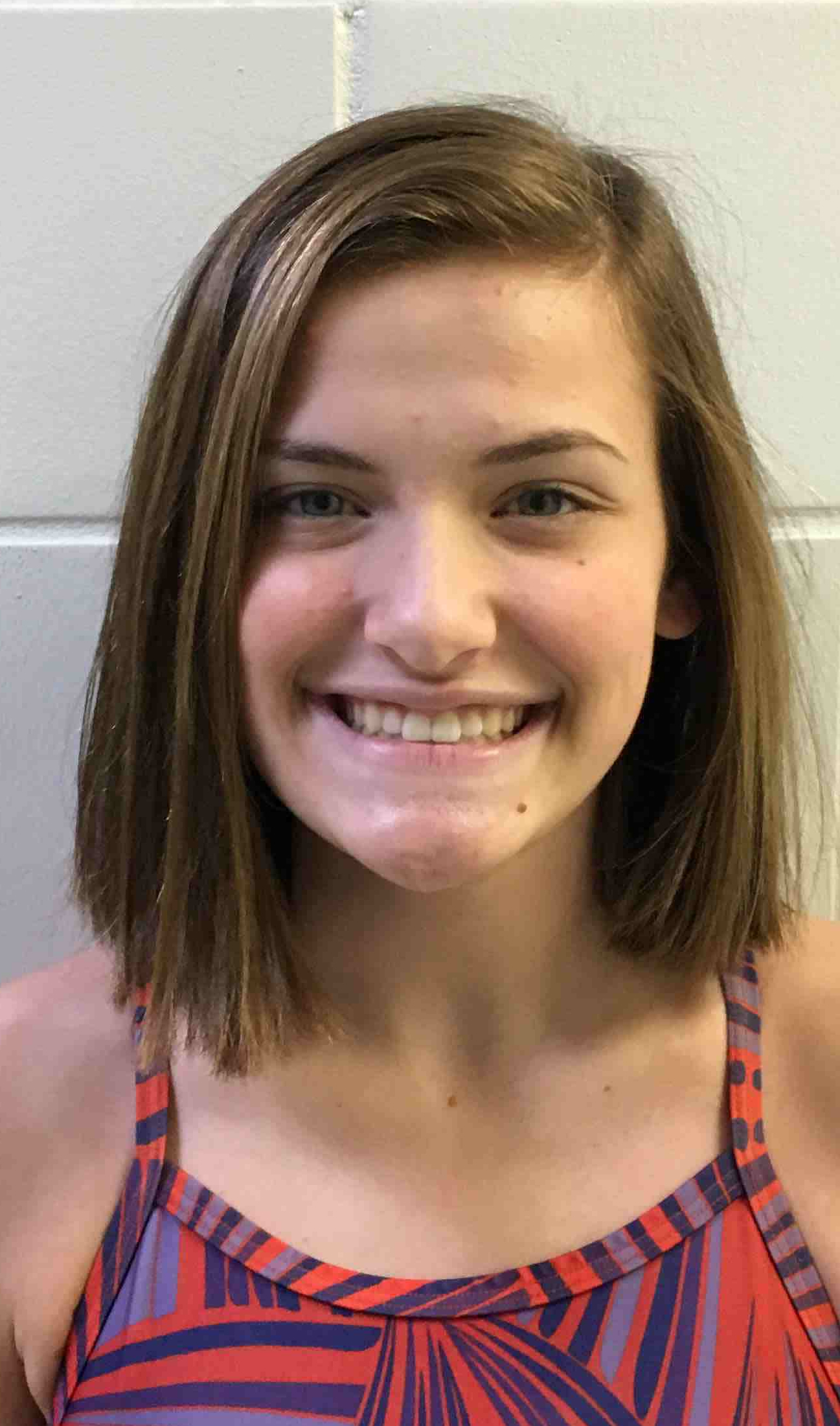 Olivia Woolf – THE SPORTS PAGE